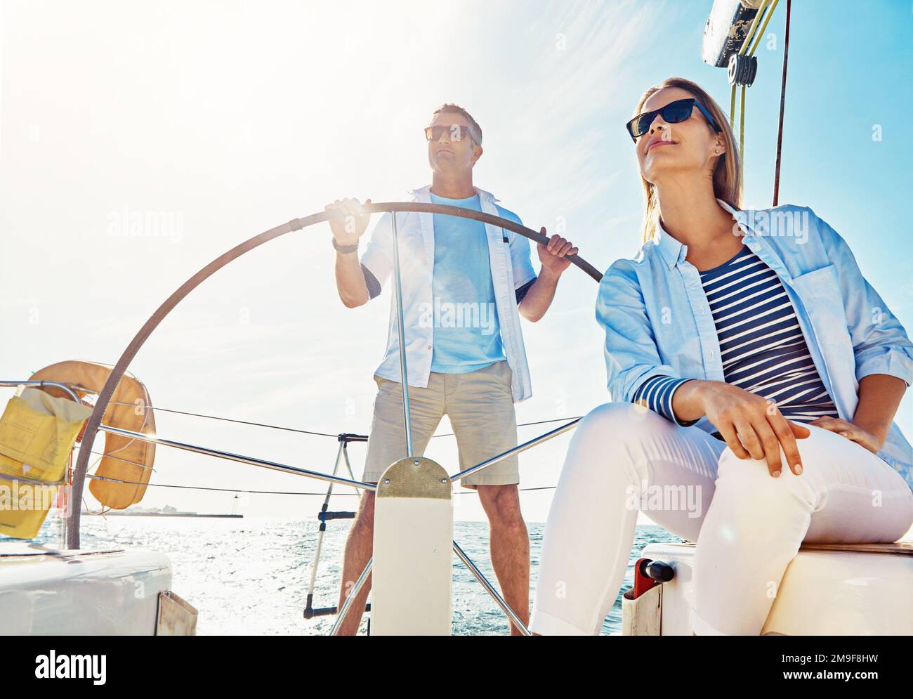 Retirement, investment and luxury with couple on yacht for summer ...