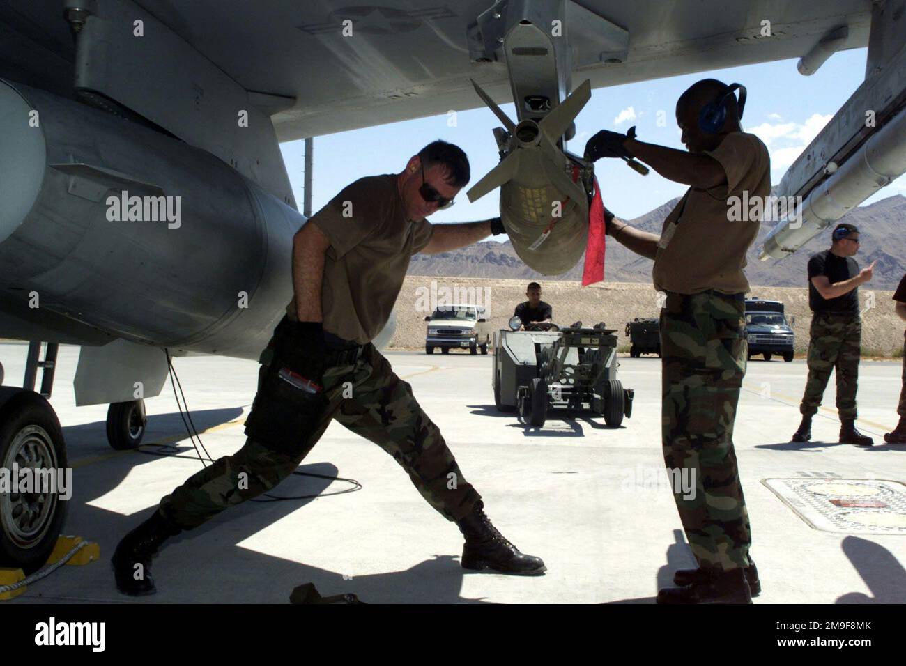 SENIOR AIRMAN Horace Abner (right) and STAFF Sergeant Samuel Alley ...