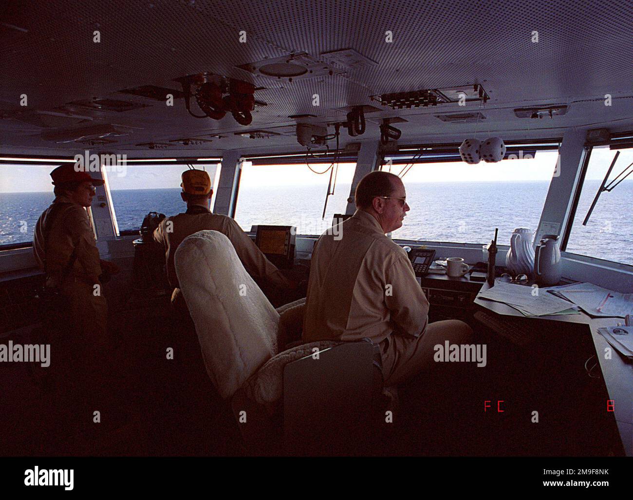 US Navy Captain David Logsdon, Commanding Officer, USS HARRY S. TRUMAN (CVN 75), watches flight ...