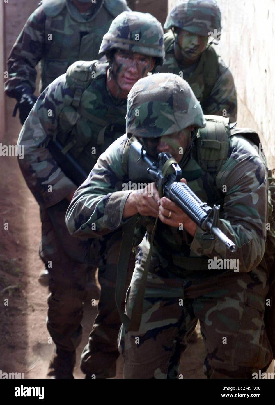 US Marines from 1ST Battalion, 3rd Marines, Weapons Company, armed with ...
