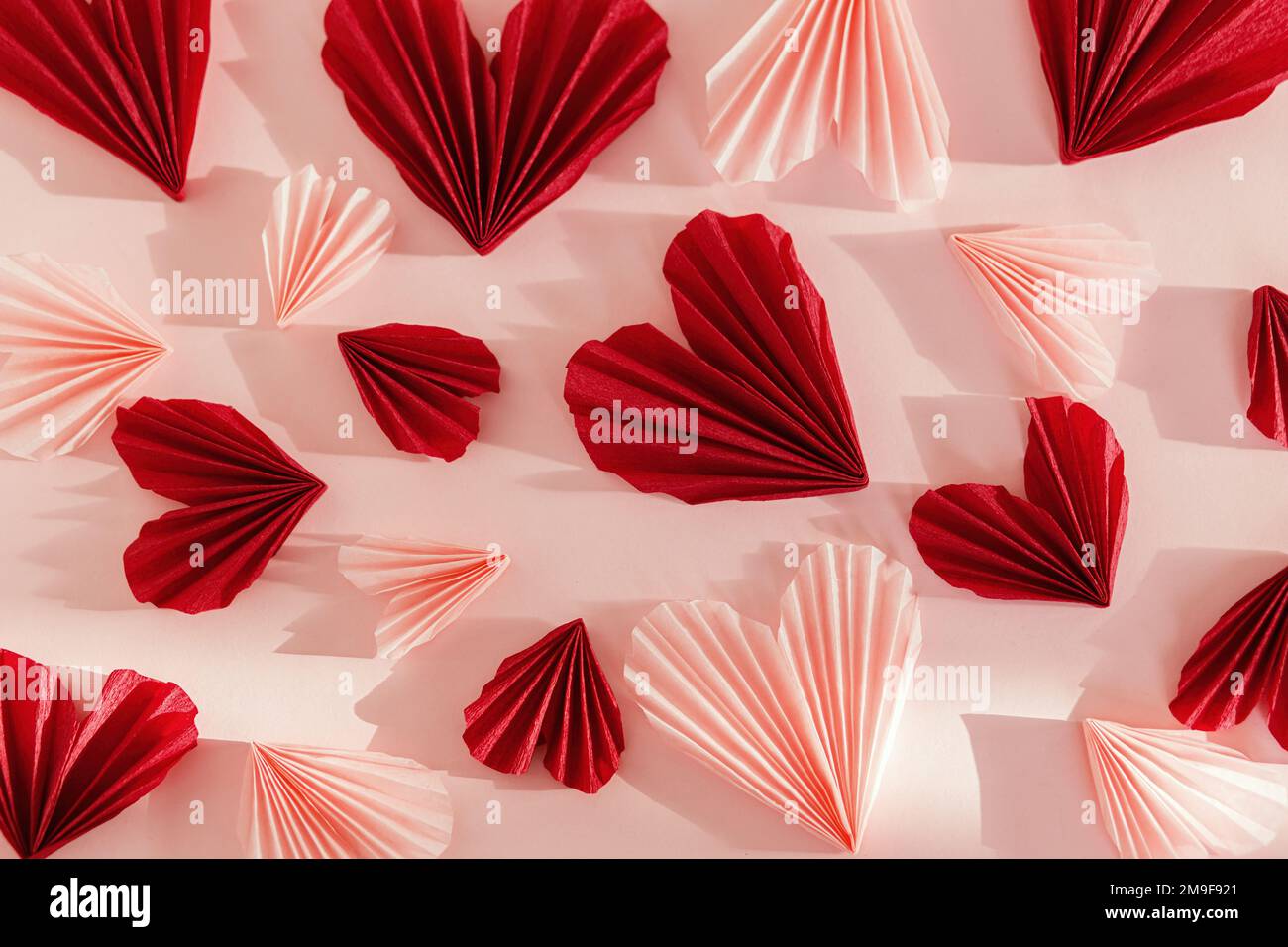 Valentines day flat lay. Stylish pink and red hearts composition on ...