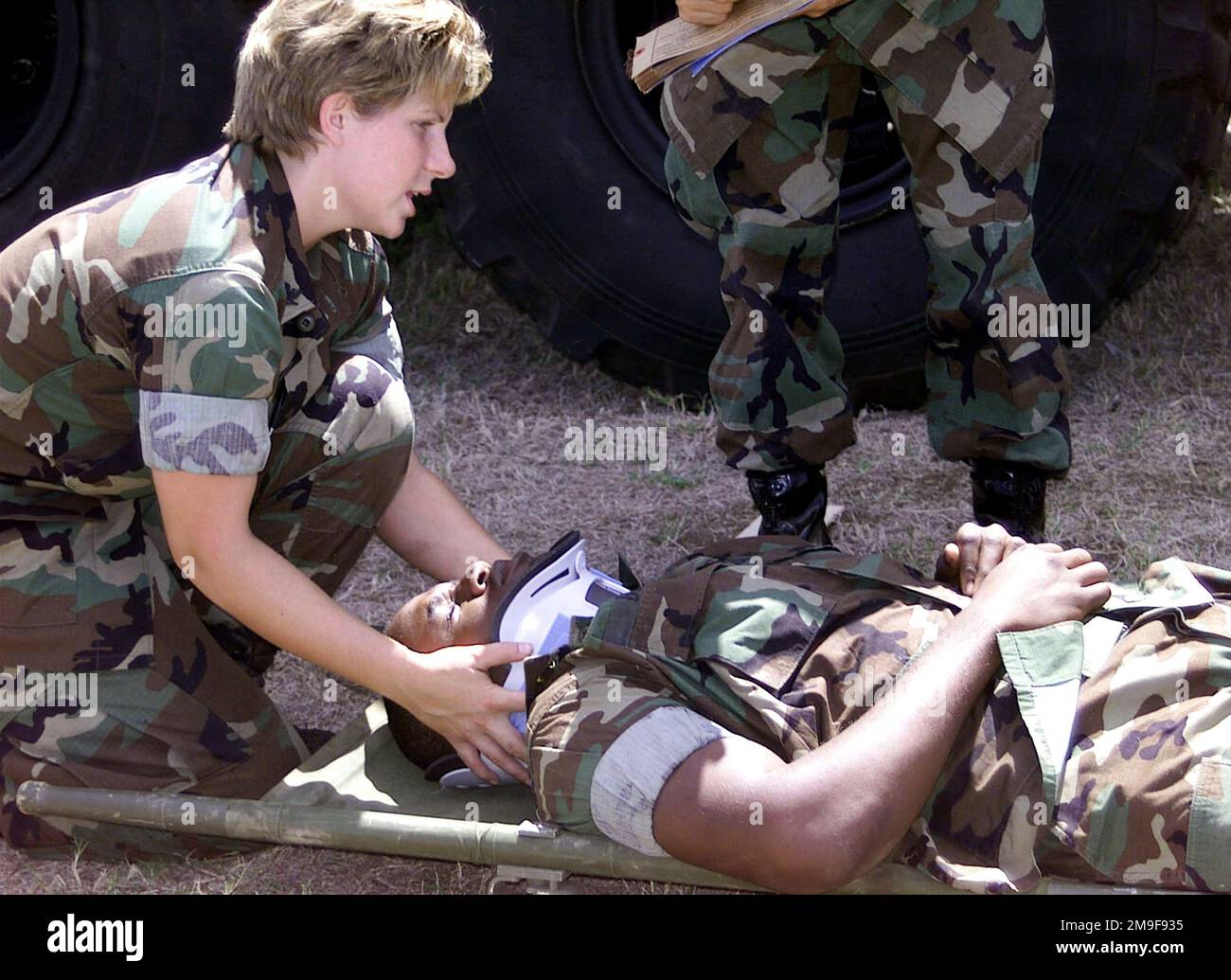 US Navy Hospital Corpsman 3rd Class E. Smith, of the Combat Service ...