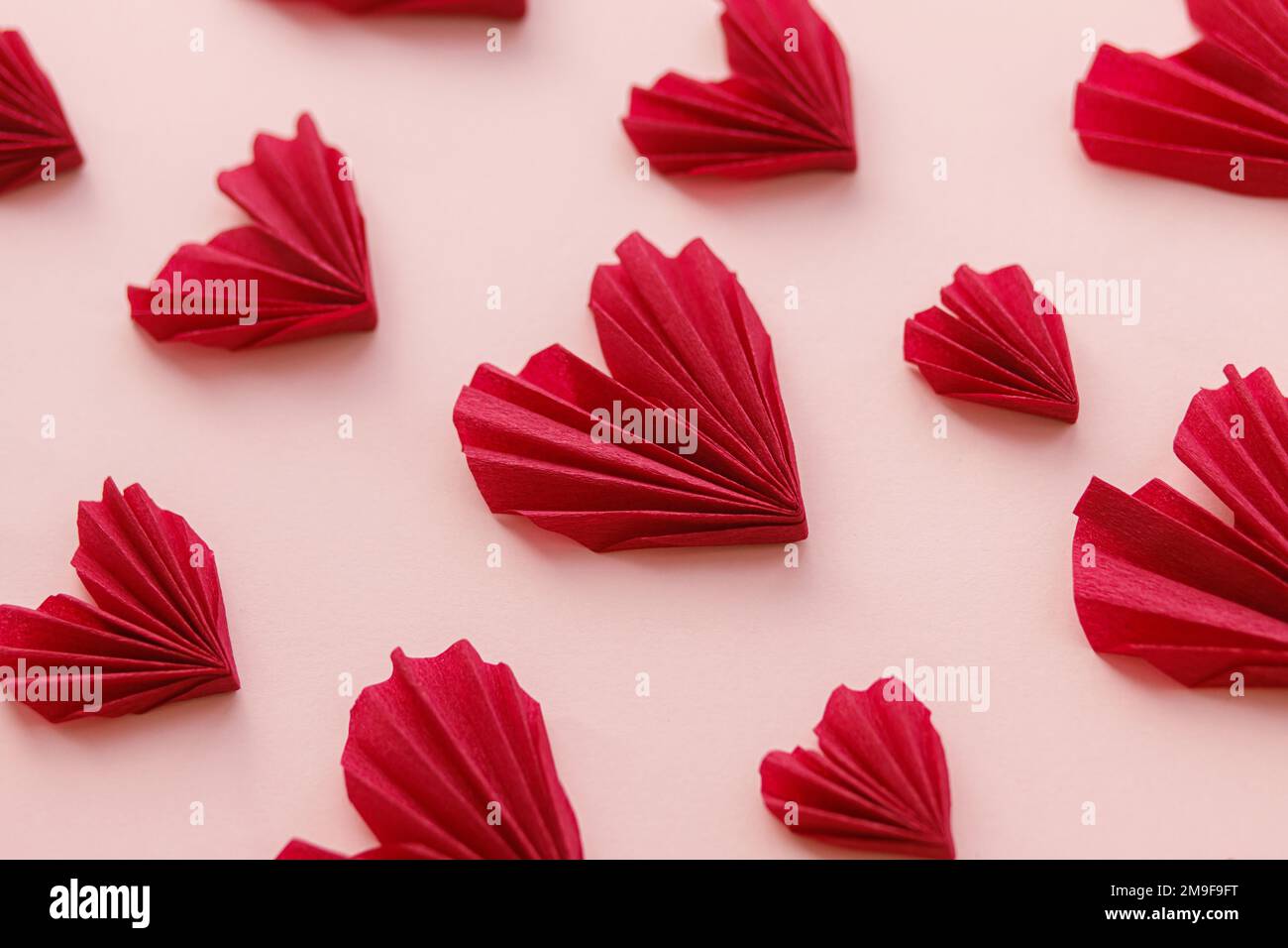 Happy Valentine's day. Stylish red hearts composition on pink paper ...