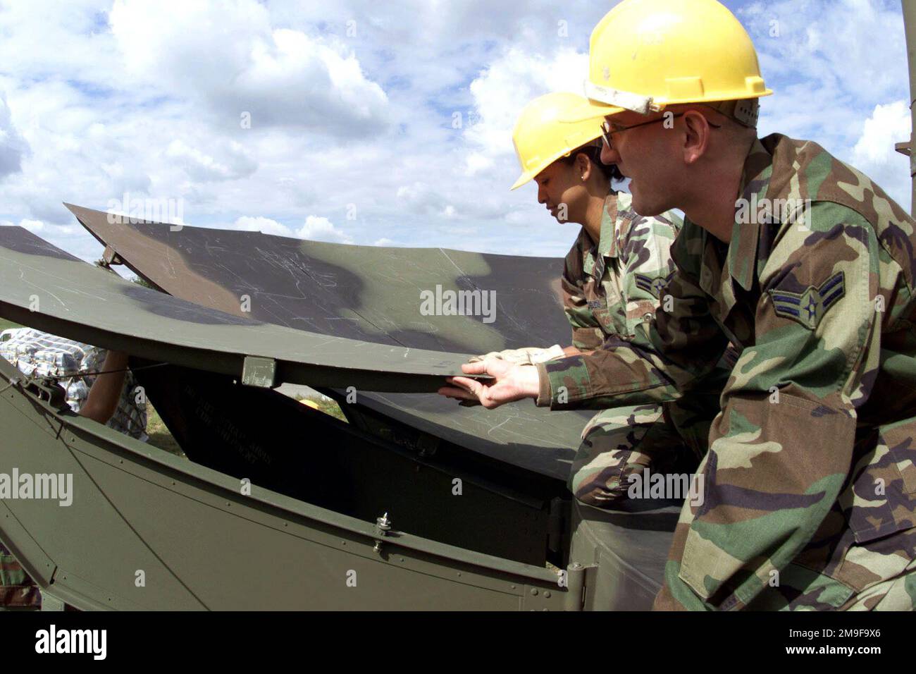 US Air Force AIRMAN First Class Jason Baum and USAF AIRMAN First Class ...