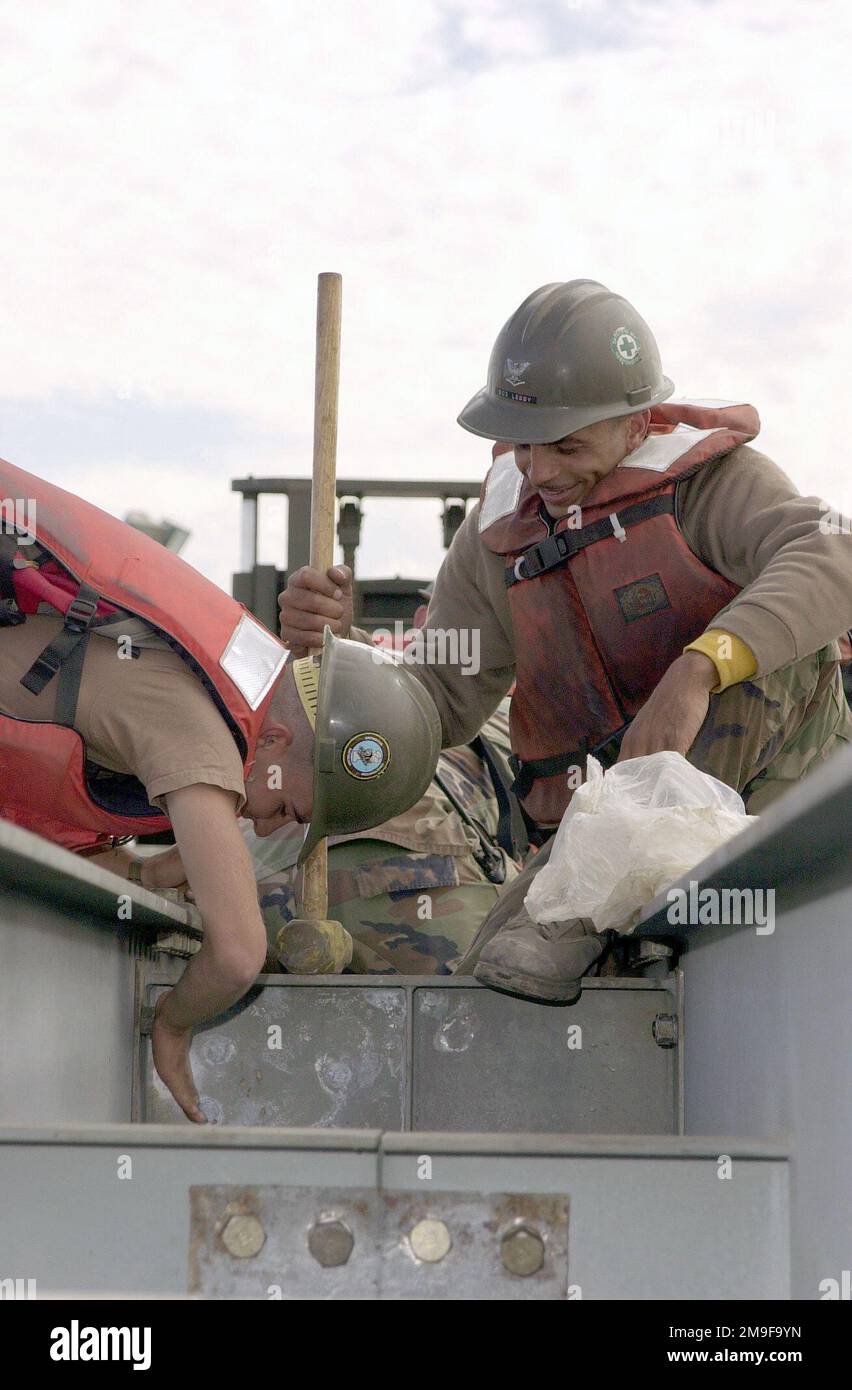 US Navy (USN) Equipment Operators (EO), Shawn Lebby and Jason Felix ...