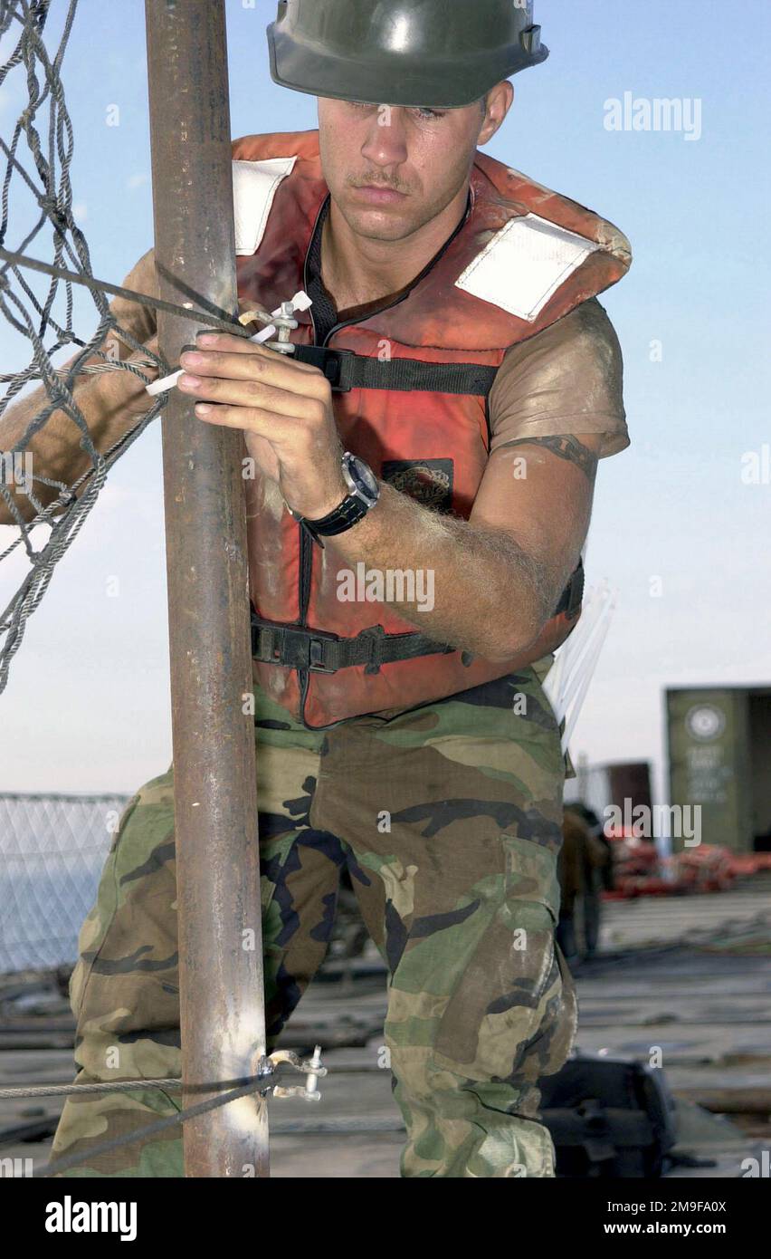 US Navy (USN) Equipment Operator (EO) Constructionman (CN) James Brumbaugh, Amphibious ...