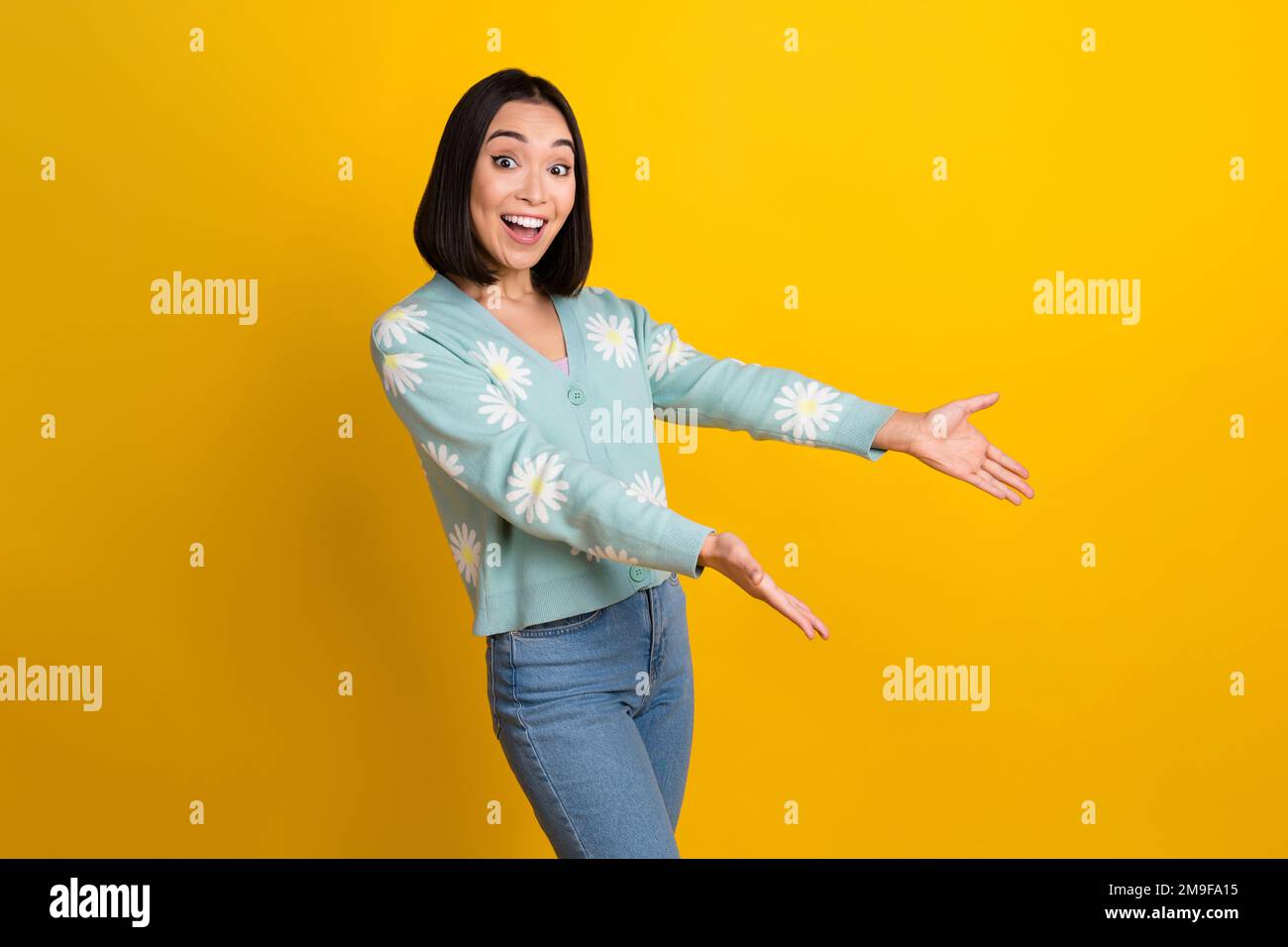 Photo of overjoyed surprised korean lady wear teal jumper daisy print ...