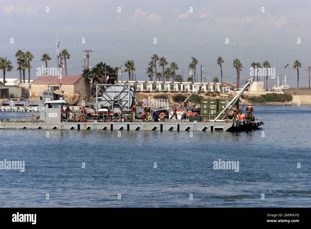 US Army Soldiers from the 331st Transportation Battalion, use a US Navy ...