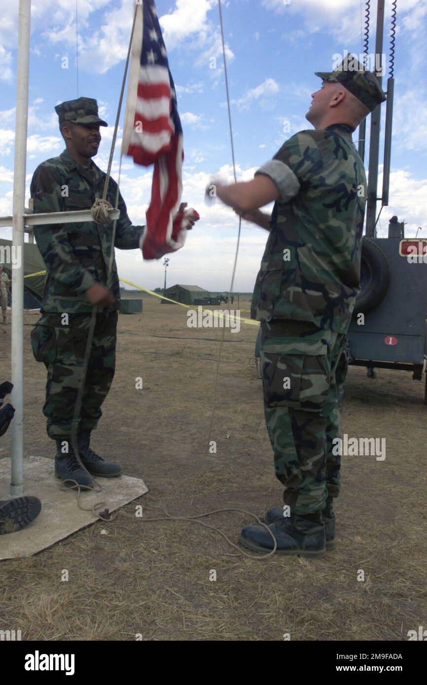 US Navy (USN) MASTER-at-Arms Third Class (MA3) Rahn Honablue (right ...