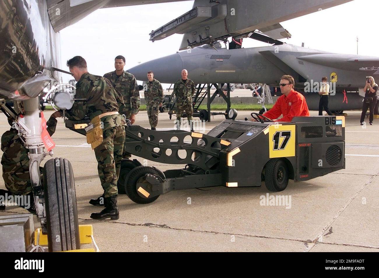 NASCAR driver Matt Kensith carefully lines up an AIM 120 missile during ...
