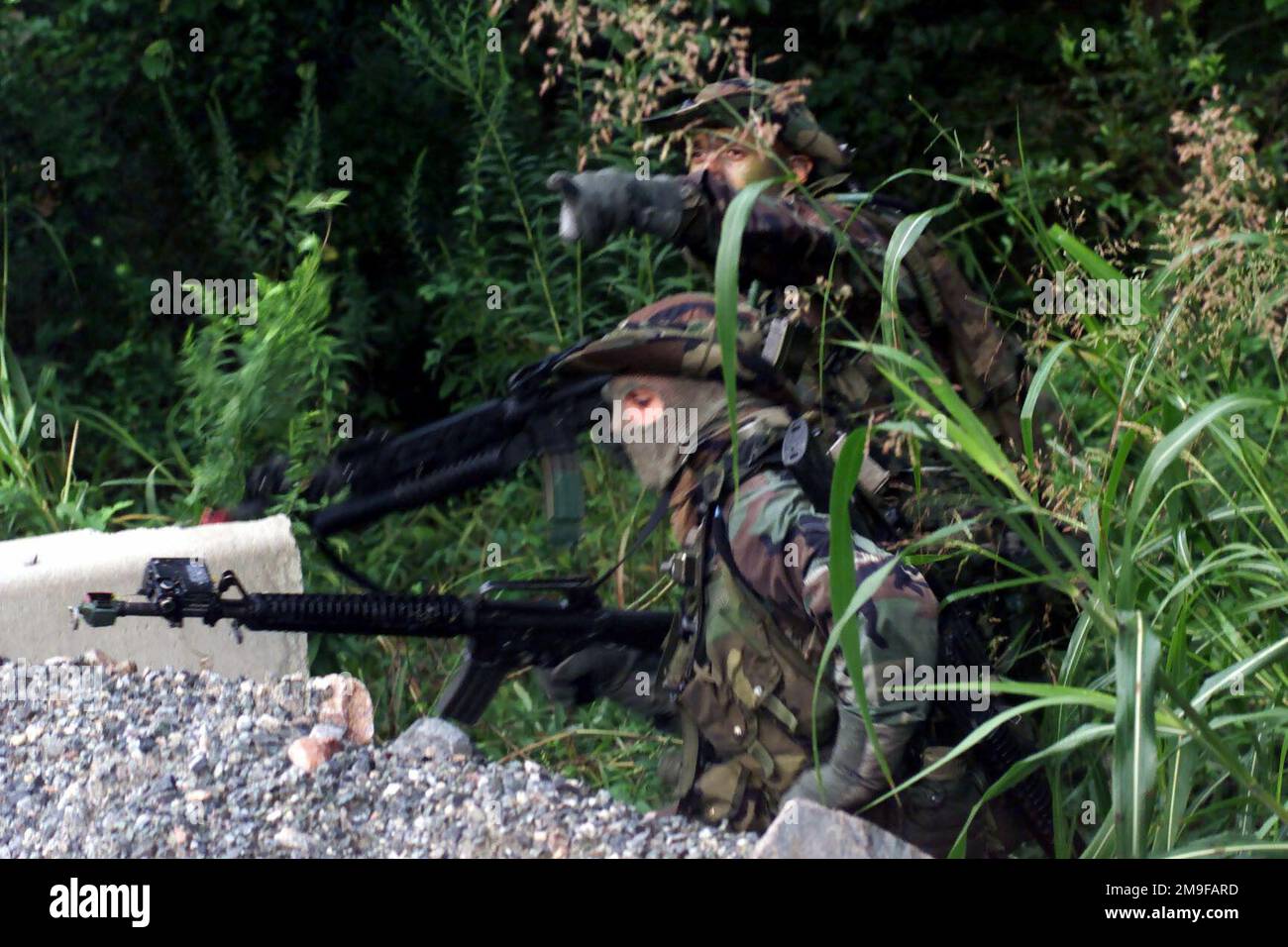 US Air Force AIRMAN First Class Frederick Bird, foregound, 1ST ...