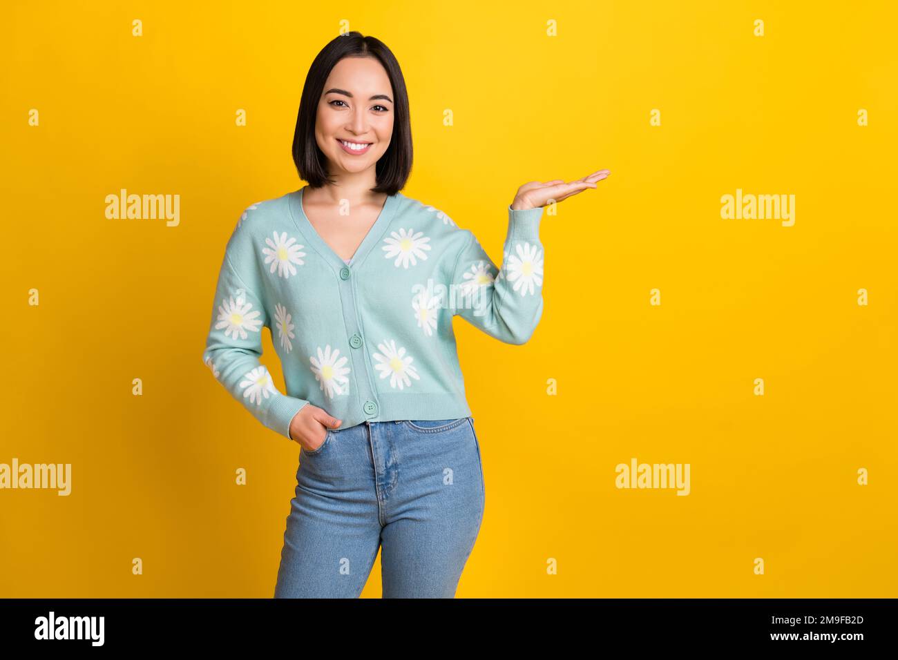 Photo of adorable pretty lady wear stylish clothes arm presenting empty ...