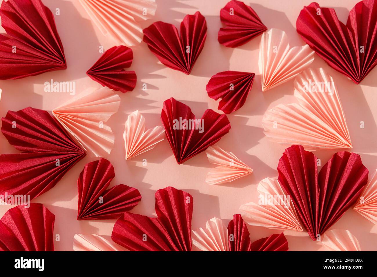 Valentines day flat lay. Stylish pink and red hearts composition on ...