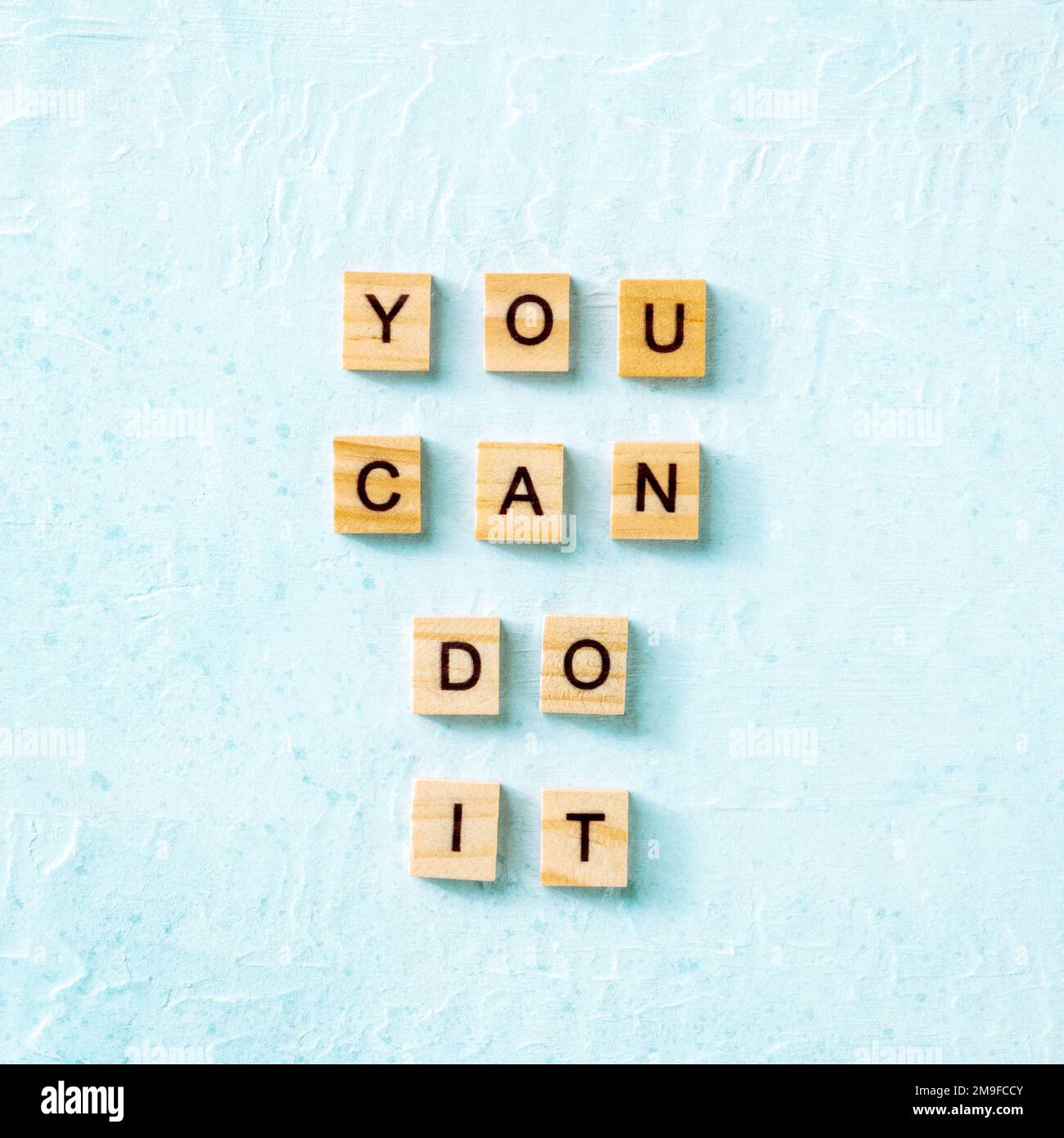 You can do it, square motivational banner with letters on a blue ...