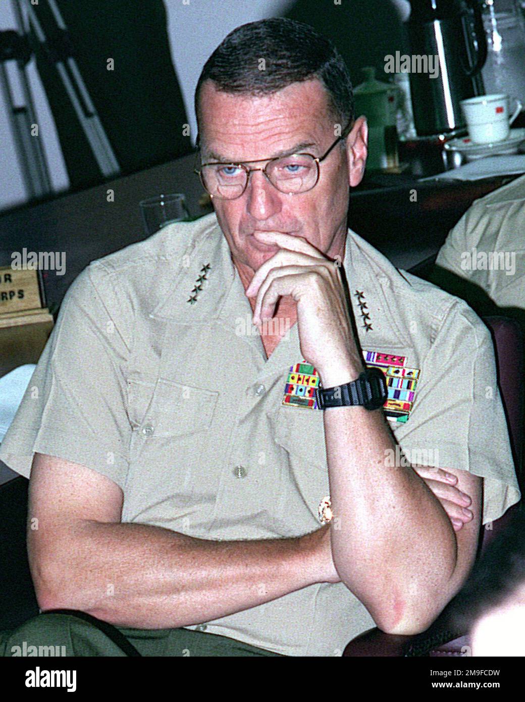 Commandant of the Marine Corps, General James L. Jones, listens to the ...
