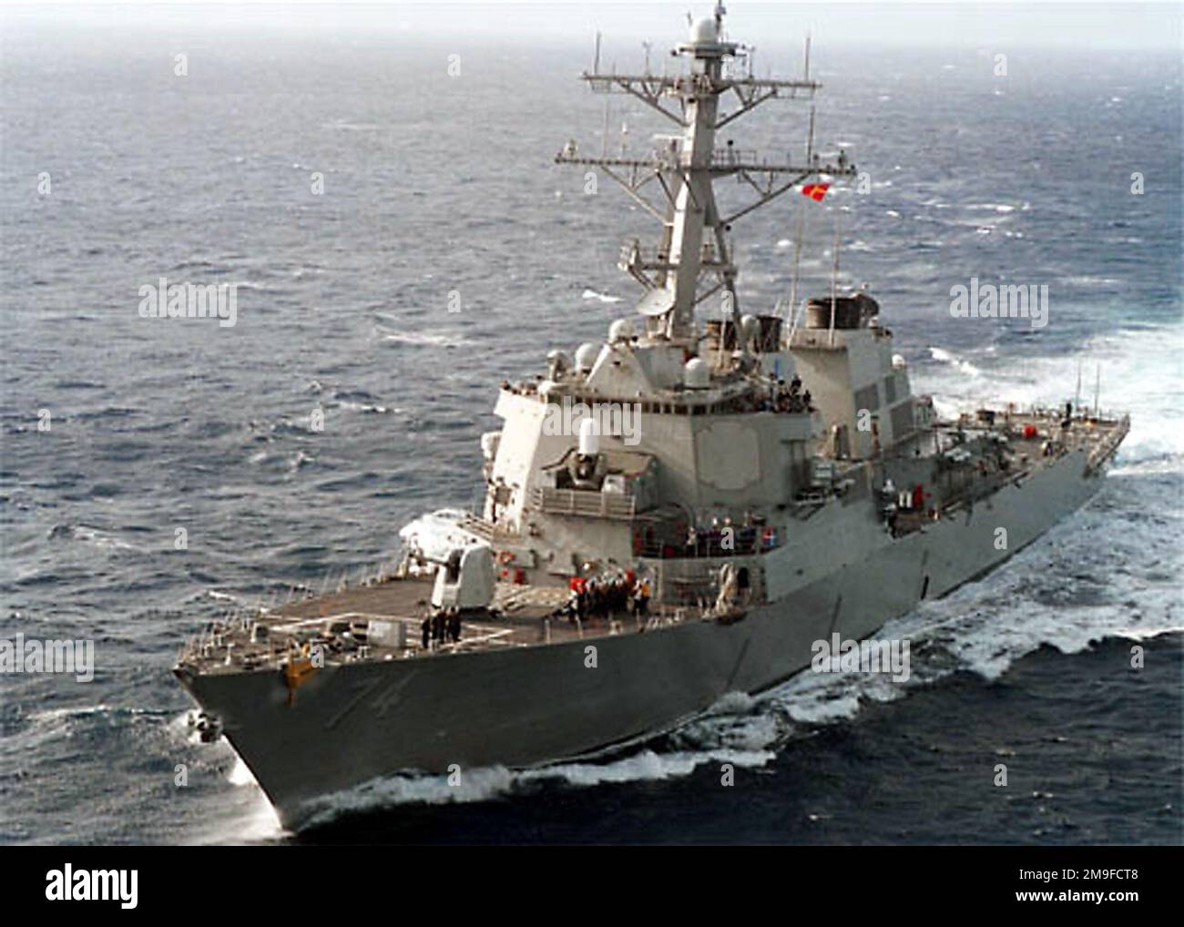 The guided missile destroyer USS MCFAUL (DDG 74) approaches the USS ...