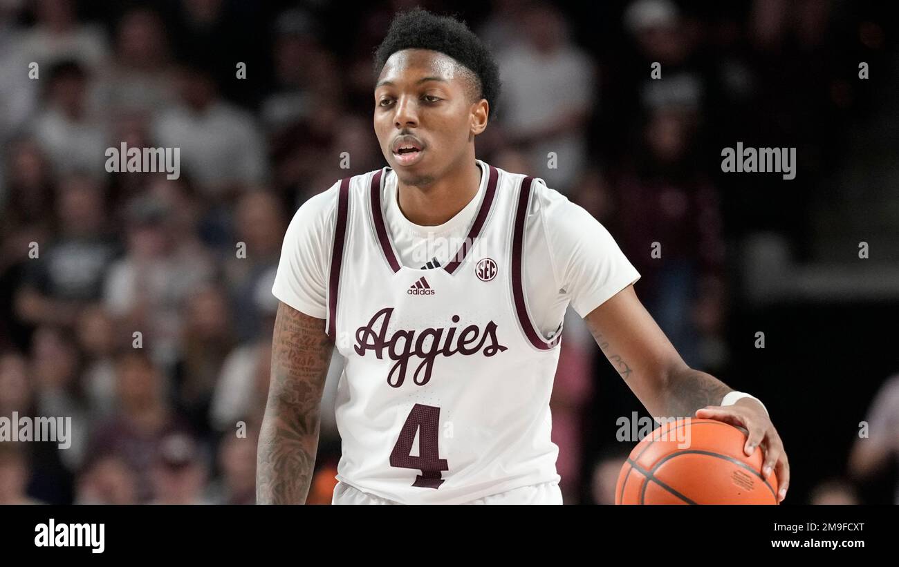 Texas A&M guard Wade Taylor IV (4) brings the ball down court against ...