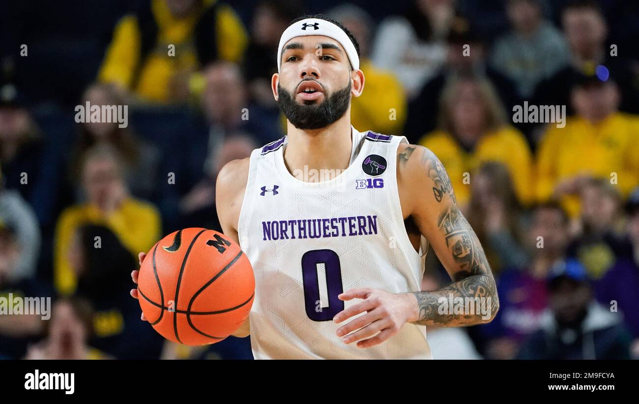 Northwestern guard Boo Buie plays against Michigan in the first half of an NCAA college ...