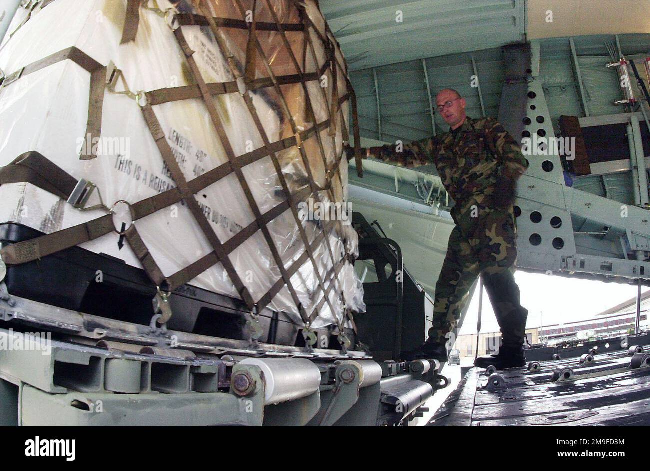 US Air Force Technical Sergeant Kenneth Holmes keeps an eye on the ...