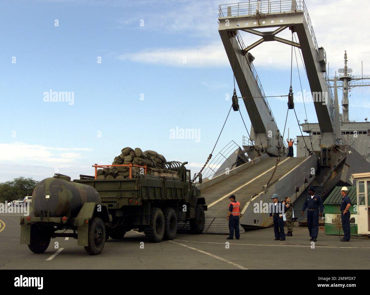 1ST Battalion, 3rd Marines, are loading their gear on the USS FREDERICK ...