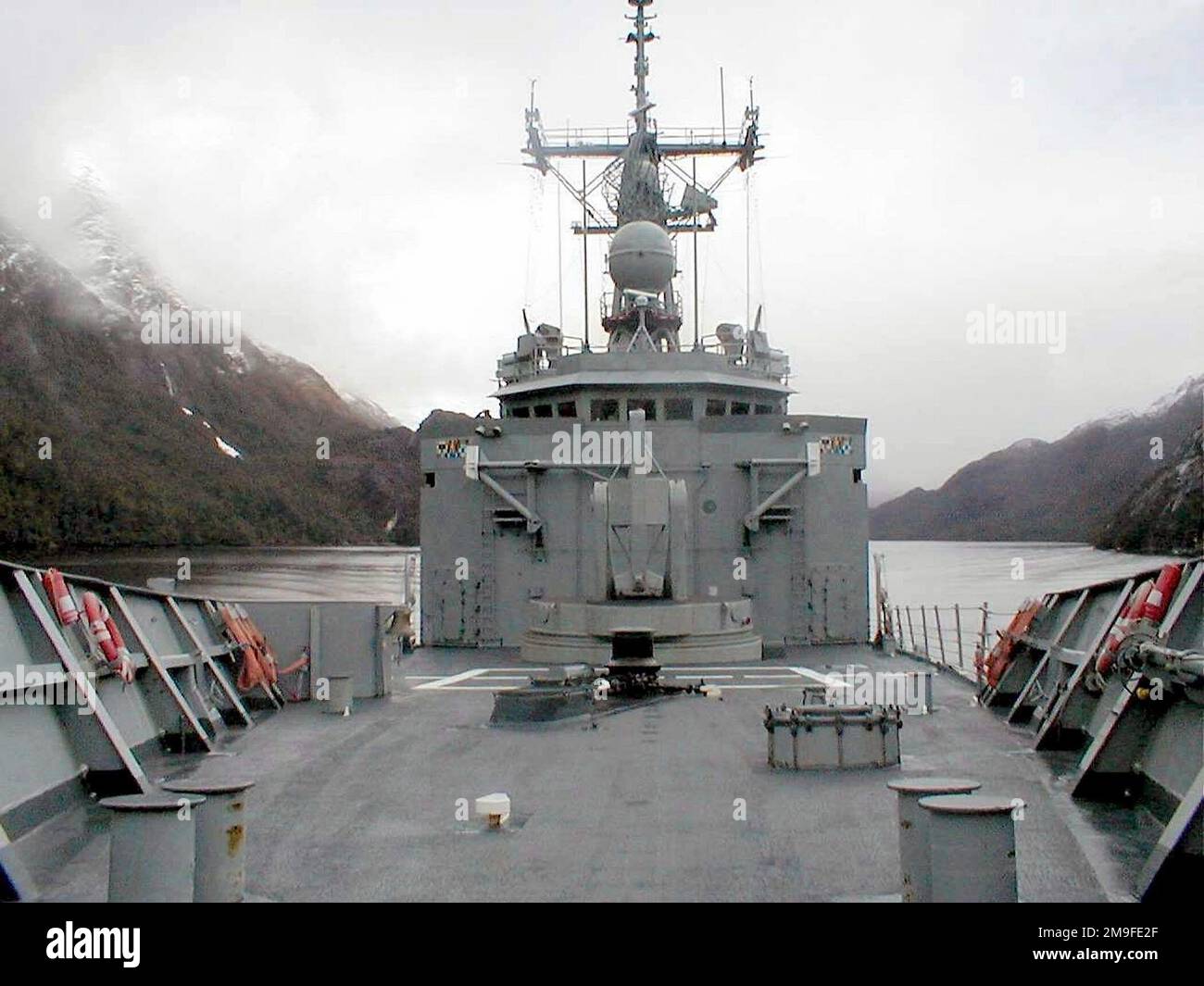 The USS KLAKRING (FFG 42) navigates the tight canyons and fjords of the ...