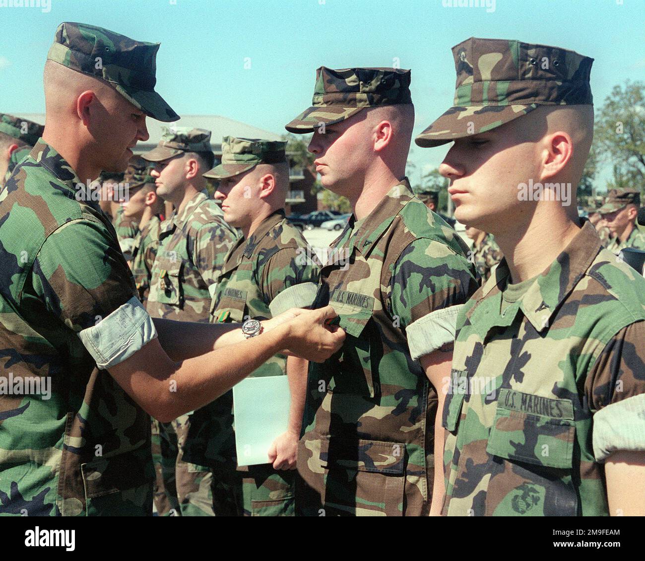 USMC Marines from Headquaters and Headquarters Squadron recieve the ...