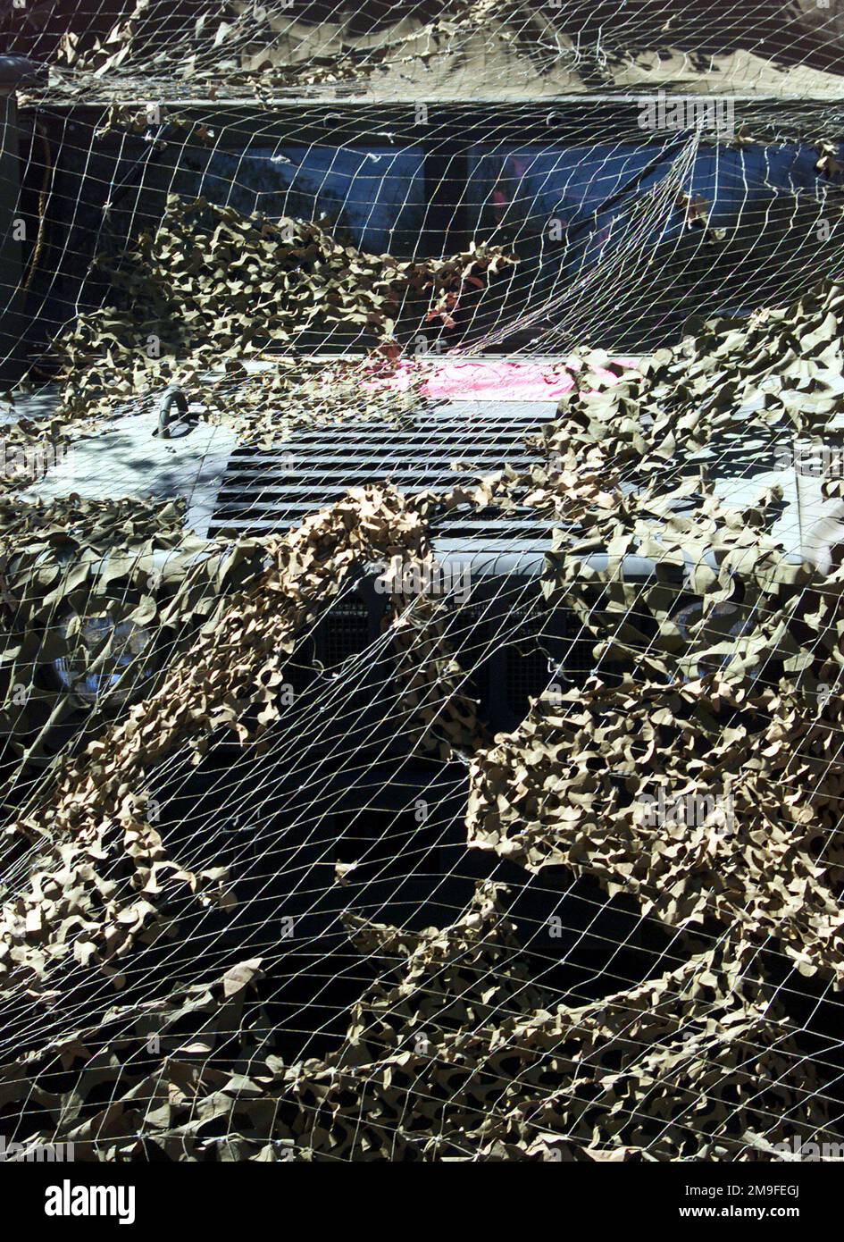2nd Battalion, 3rd Marines conceal their High-Mobility Multipurpose ...
