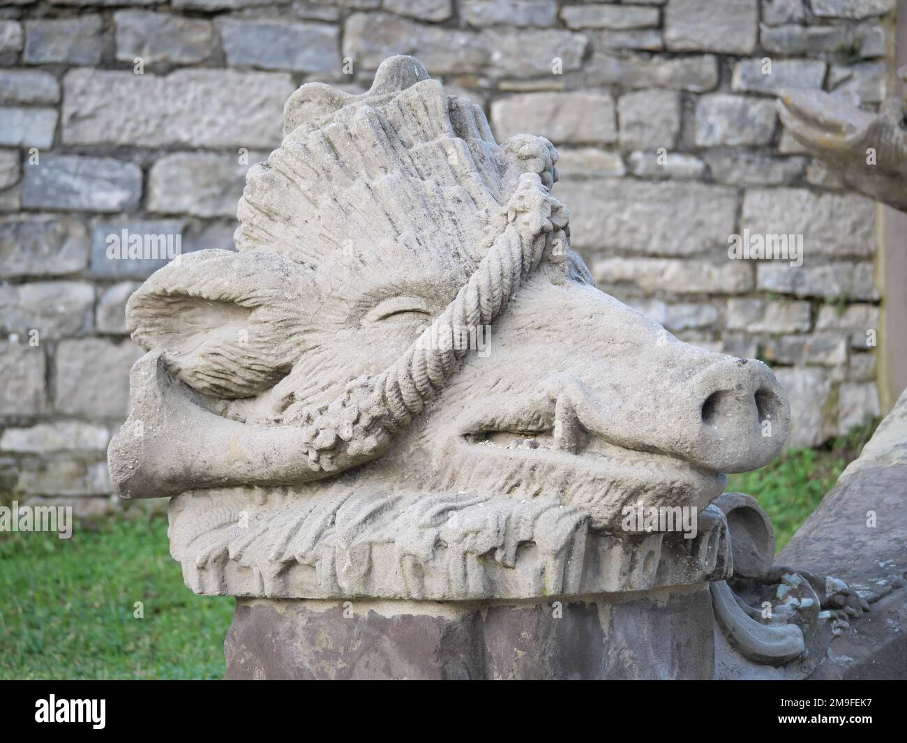 Baroque stone statue of a wild boar head in a palace park Stock Photo ...