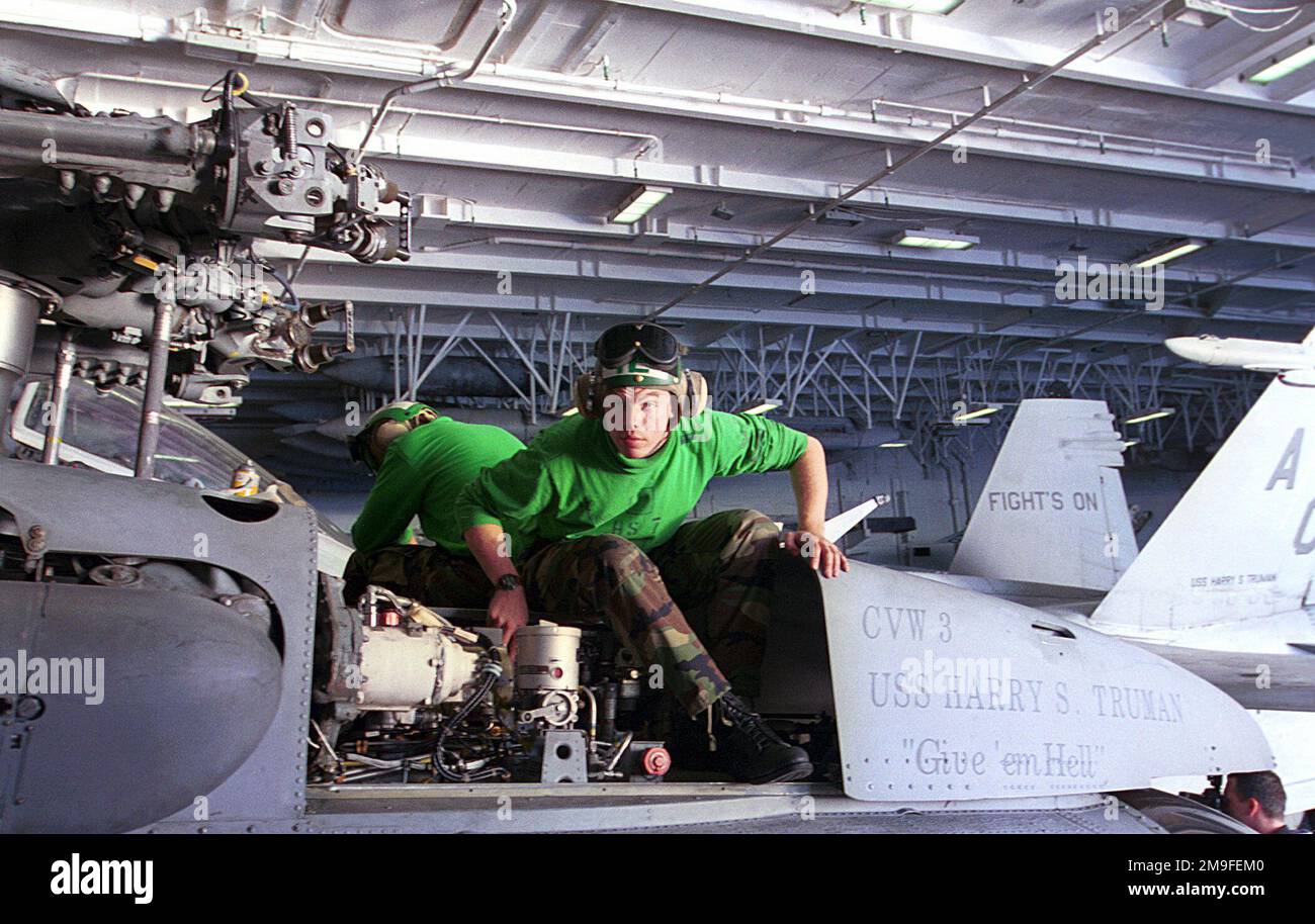 US Navy Aviation Electrician's Mate Third Class Jeremy R. King performs ...