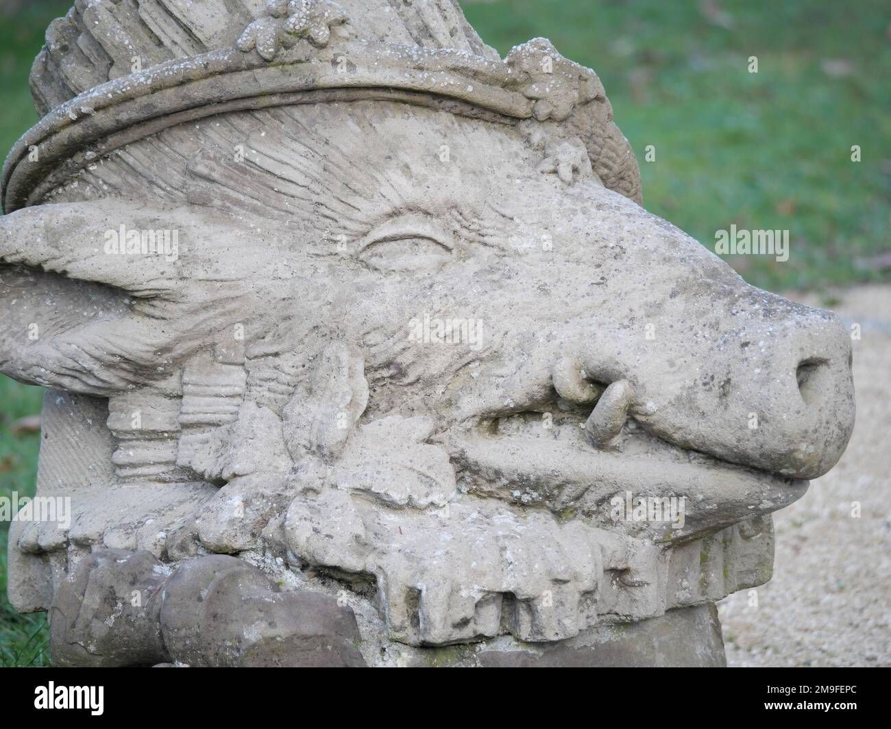 Baroque stone statue of a wild boar head in a palace park Stock Photo ...