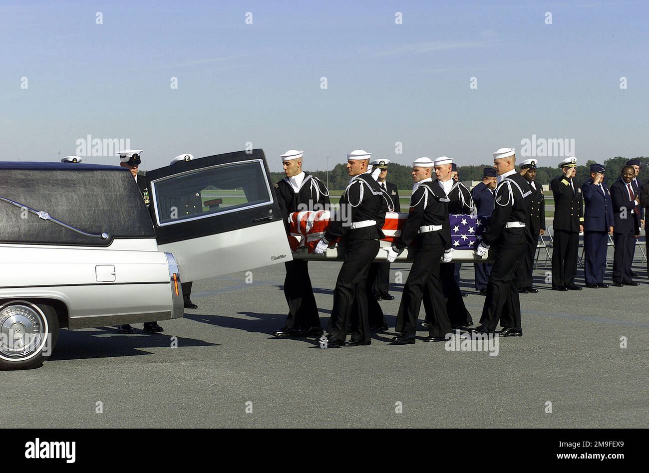 The United States Navy Ceremonial Guard places the casket of a fallen ...