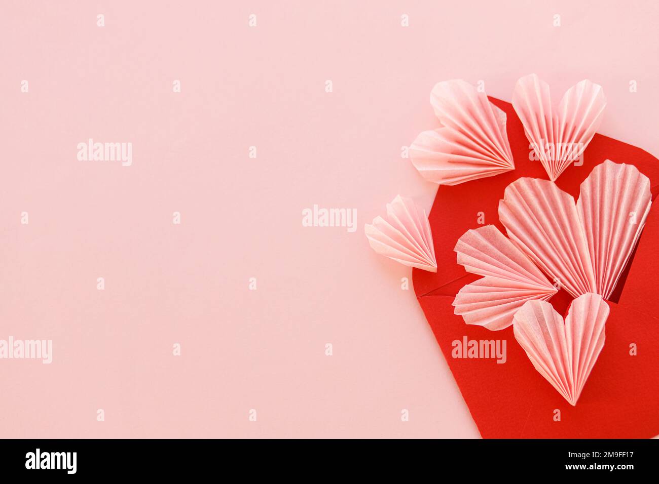 Happy Valentine's day! Stylish red envelope with pink hearts flat lay ...