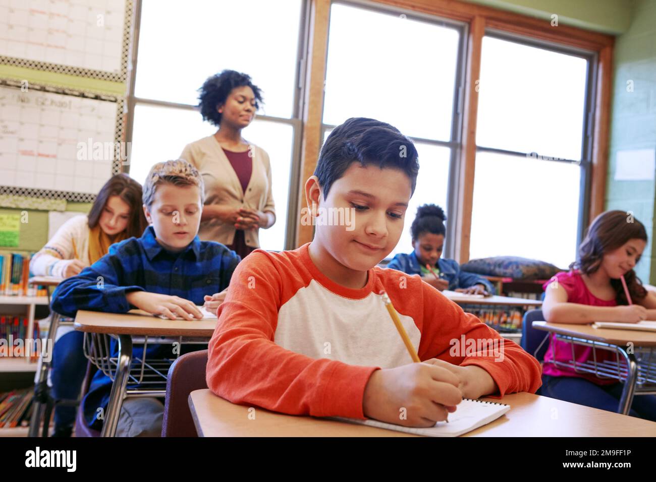 Children thinking classroom hi-res stock photography and images - Alamy