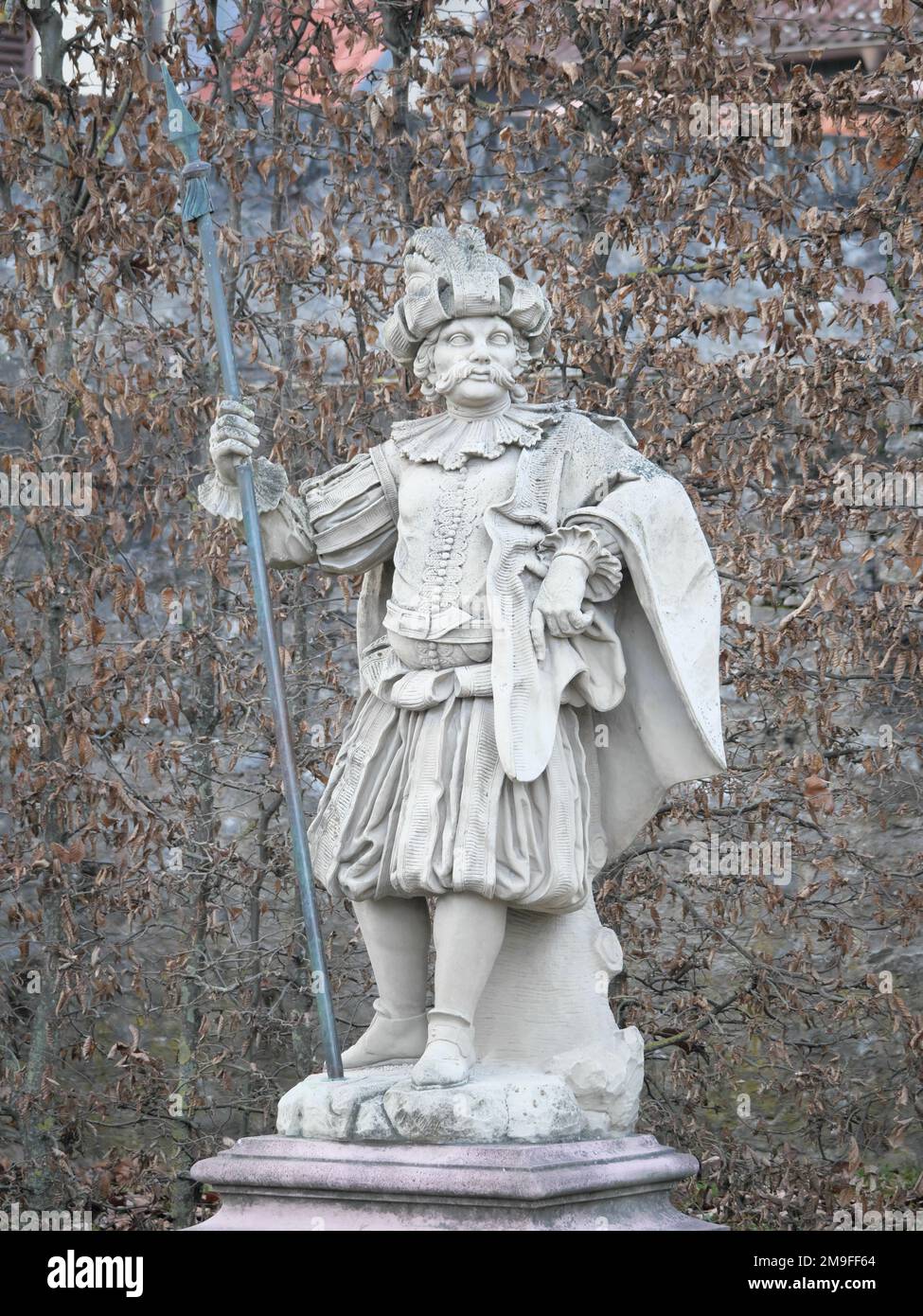 Baroque stone statue of a Turk with spear Stock Photo - Alamy