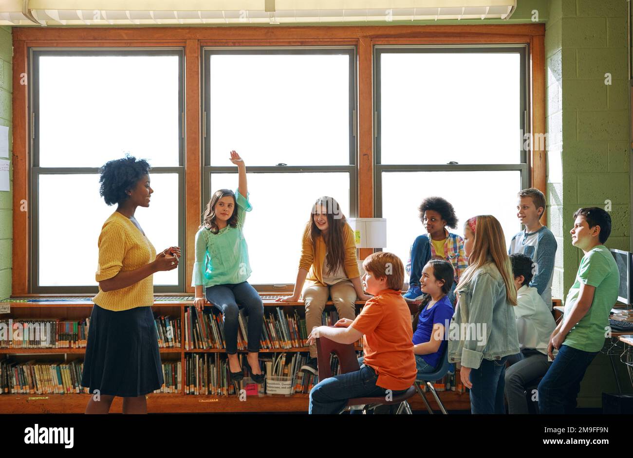 Education, learning and student with questions for teacher in middle ...