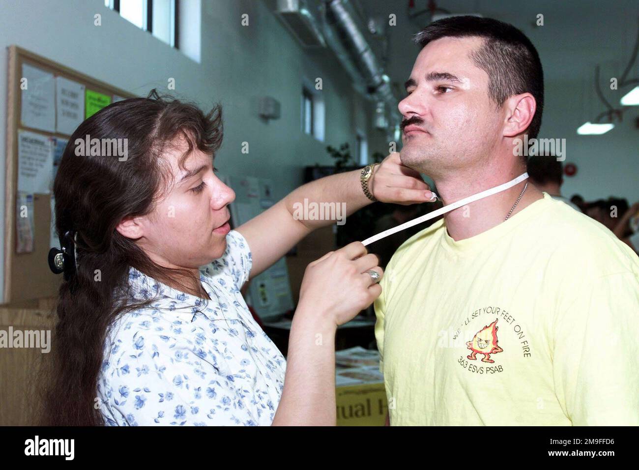 US Air Force First Lieutenant Nerayda Sevilla measures USAF STAFF ...