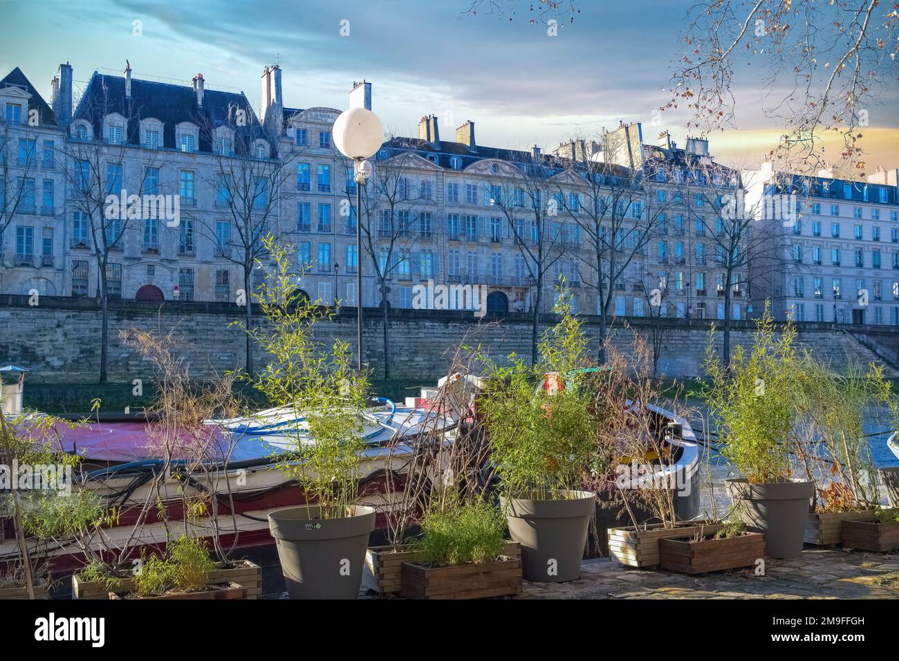Paris, ile saint-louis and quai de Bourbon, with house boats on the Seine, beautiful ancient ...
