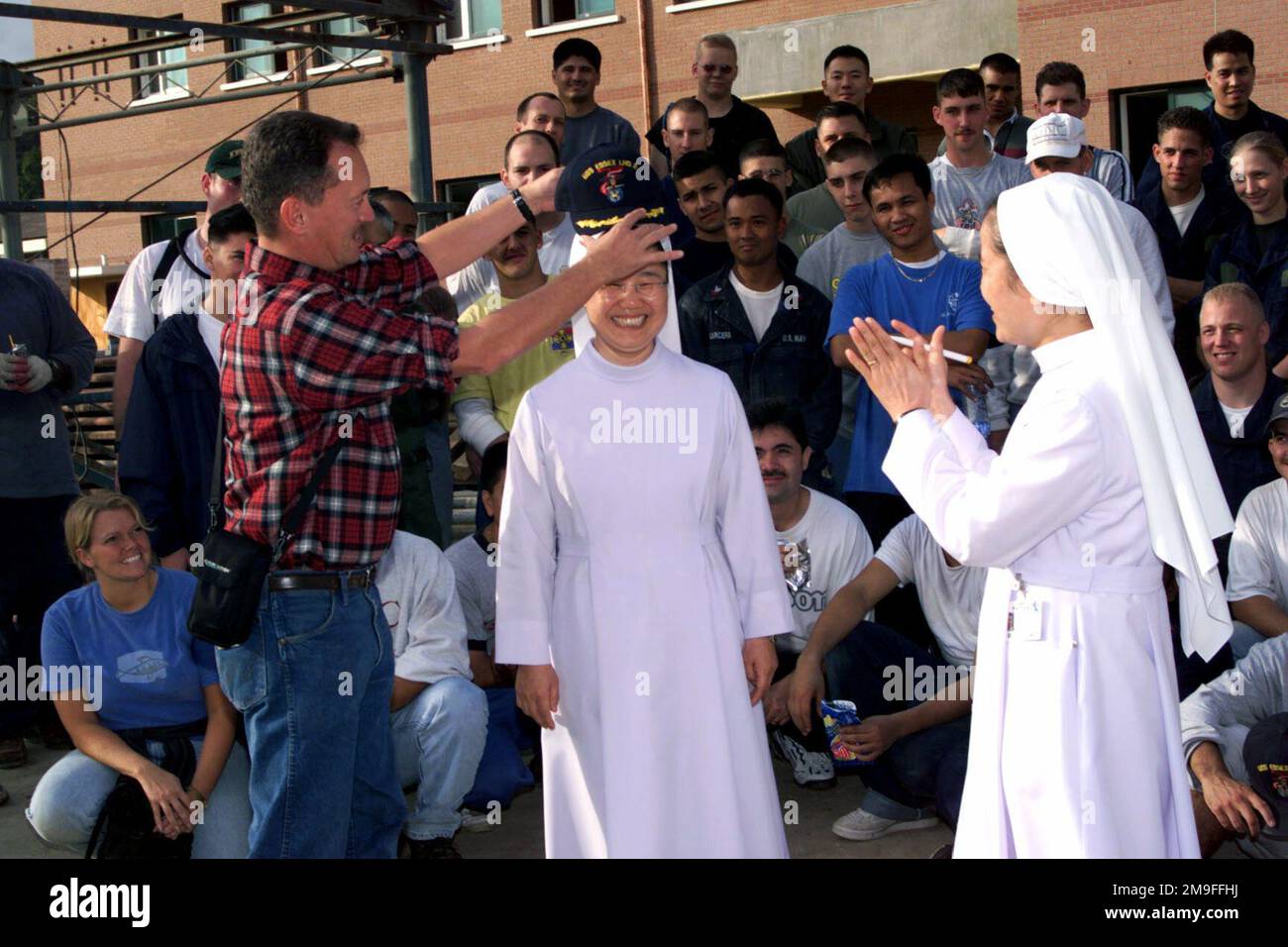 A sister of the The Handmaids of the Sacred Heart of Jesus laughingly ...