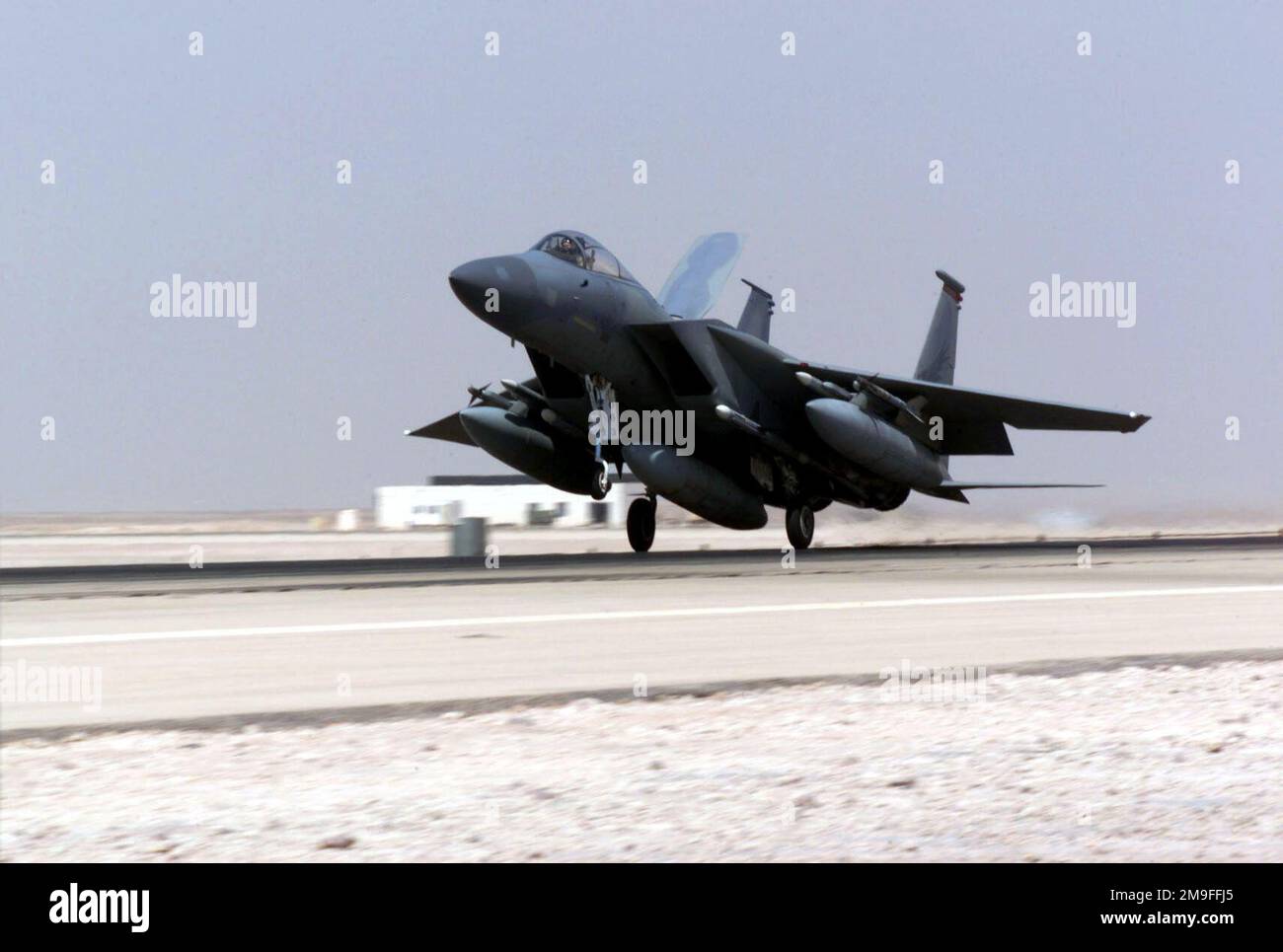 An F-15 Eagle aircraft lands at Prince Sultan Air Base, Saudi Arabia ...