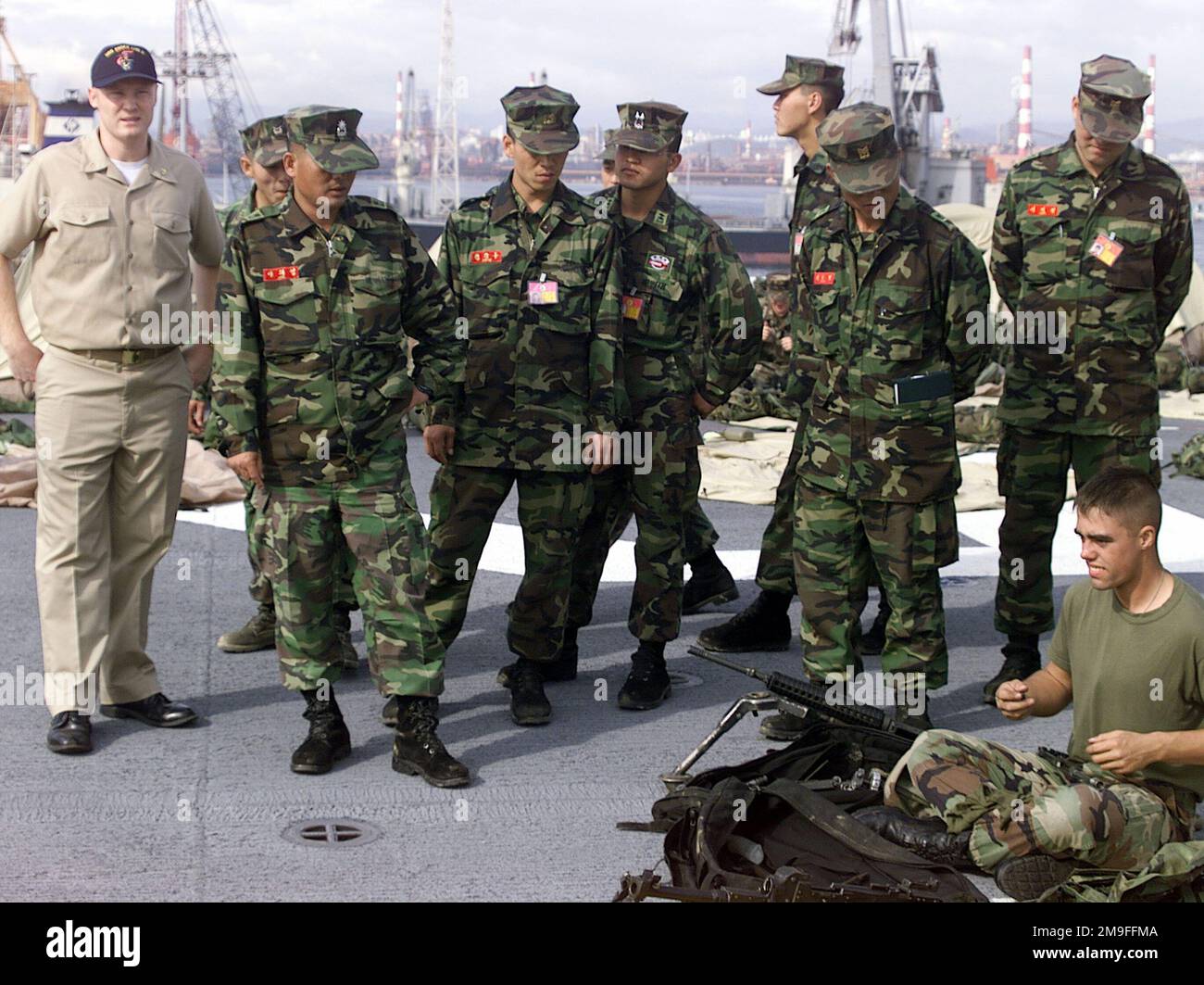US Navy ENSIGN (ENS) Mark Cole, introduces the Republic of Korea (ROK ...