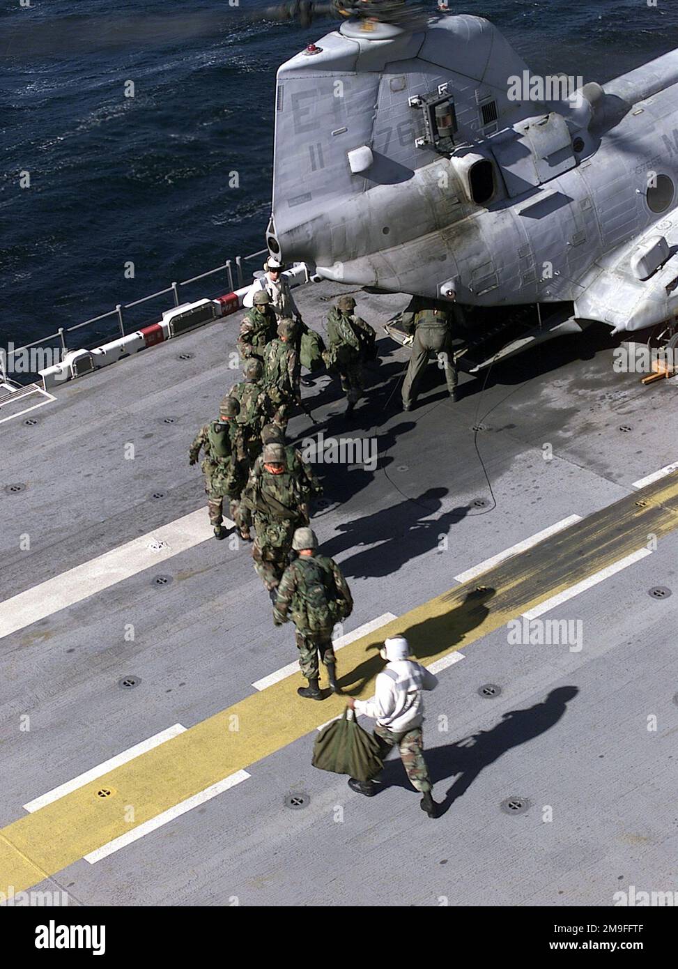 US Marines from Battalion Landing Team (BLT) load into the rear of a US ...