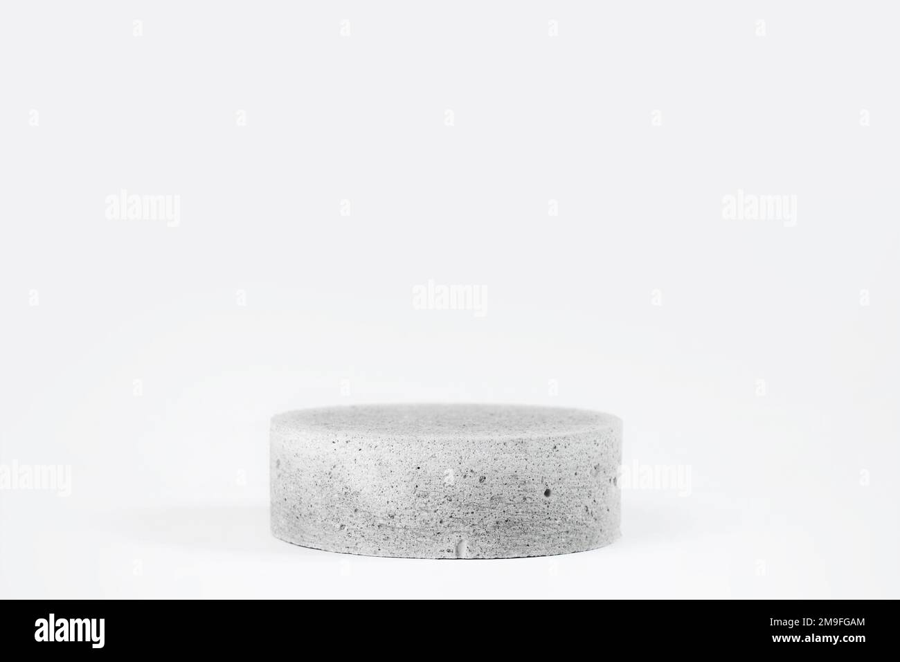 Cylinder shaped concrete podium isolated on white background Stock ...