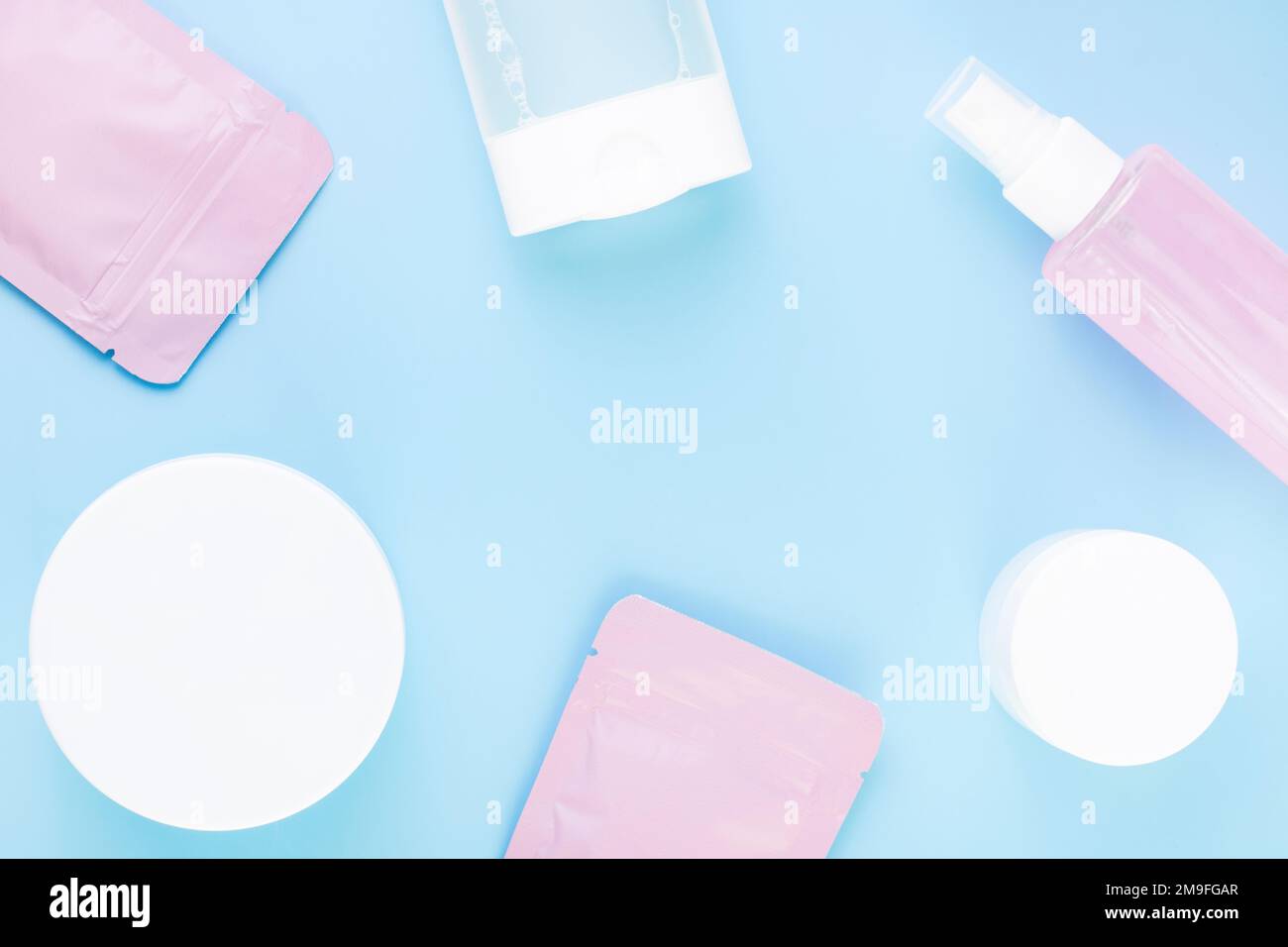 Beauty spa background. Border, frame from cosmetic products on a blue ...