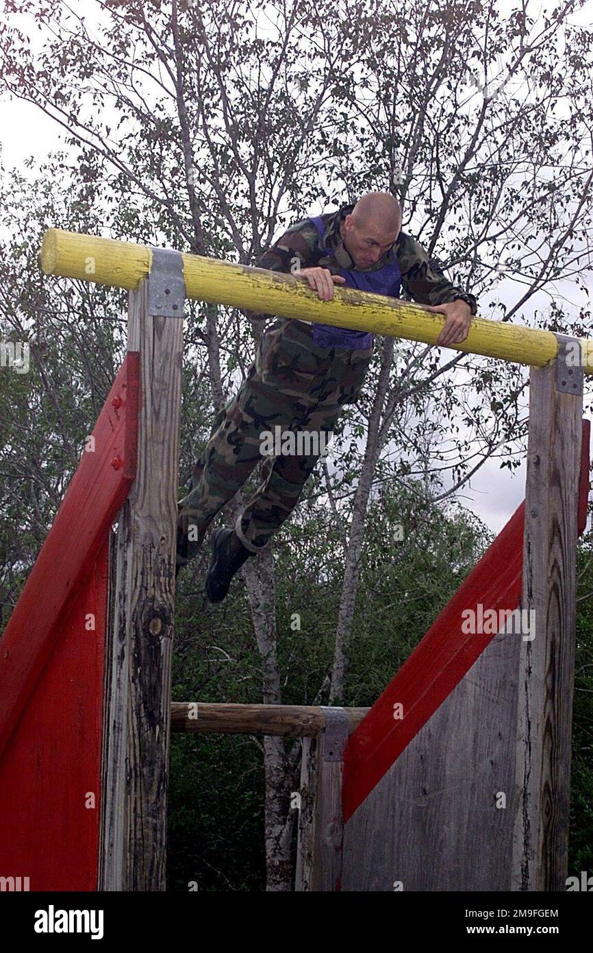 Air Mobility Commands STAFF Sergeant Jamie Newman jumps to the upper ...