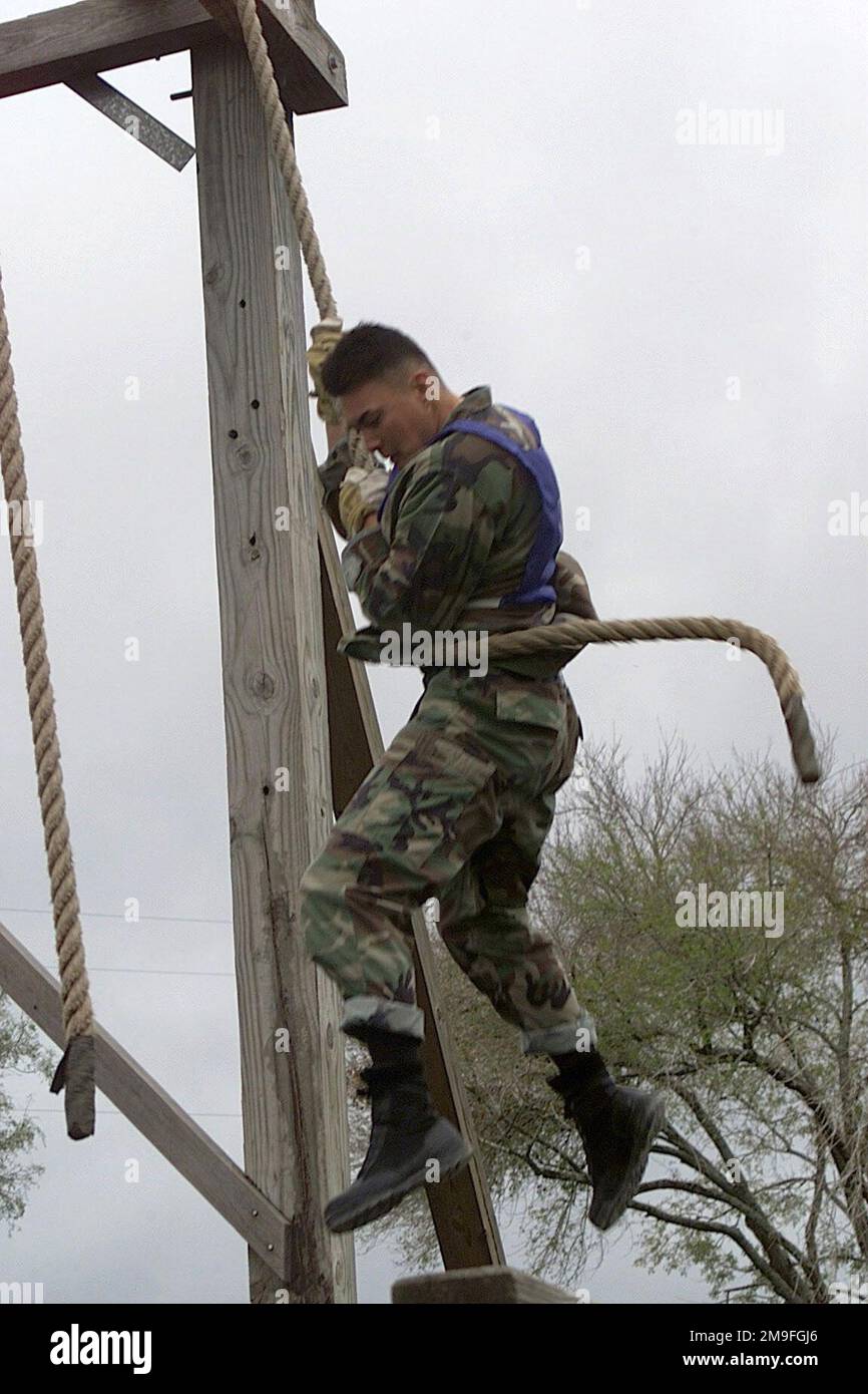 US Air Force SENIOR AIRMAN John J. Hill descends down a rope of the ...