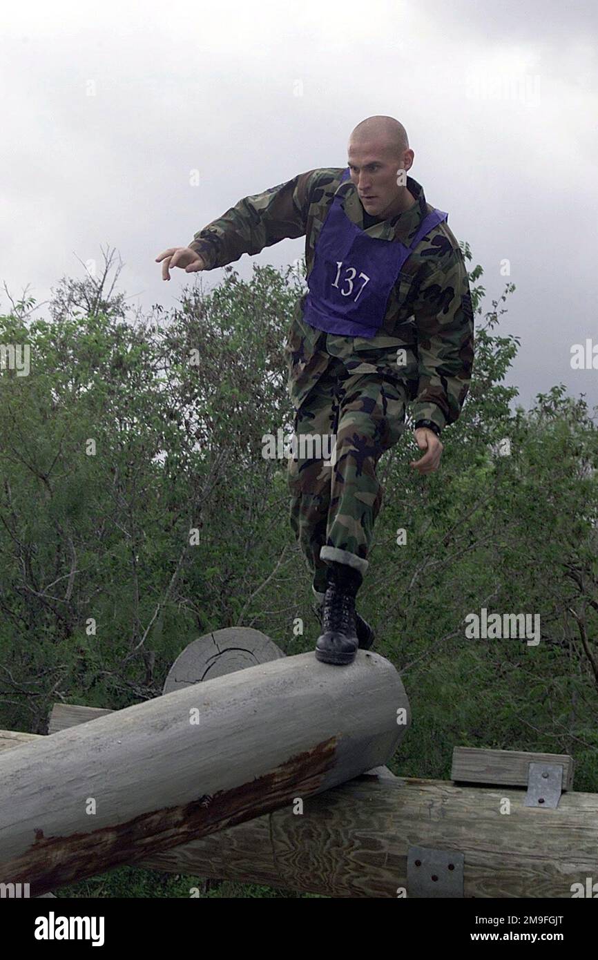 US Air Force STAFF Sergeant Jamie Newman walks over the "Easy Balancer ...