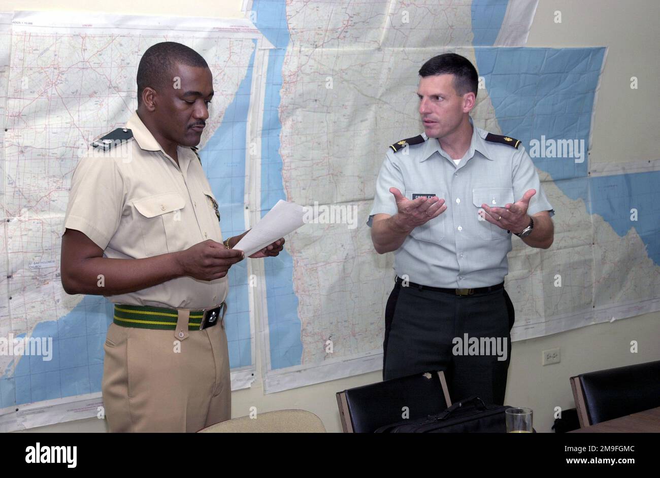 Major (MAJ) Jeff Bostick, Barbados Defense Force, (BDF), left, and MAJ ...