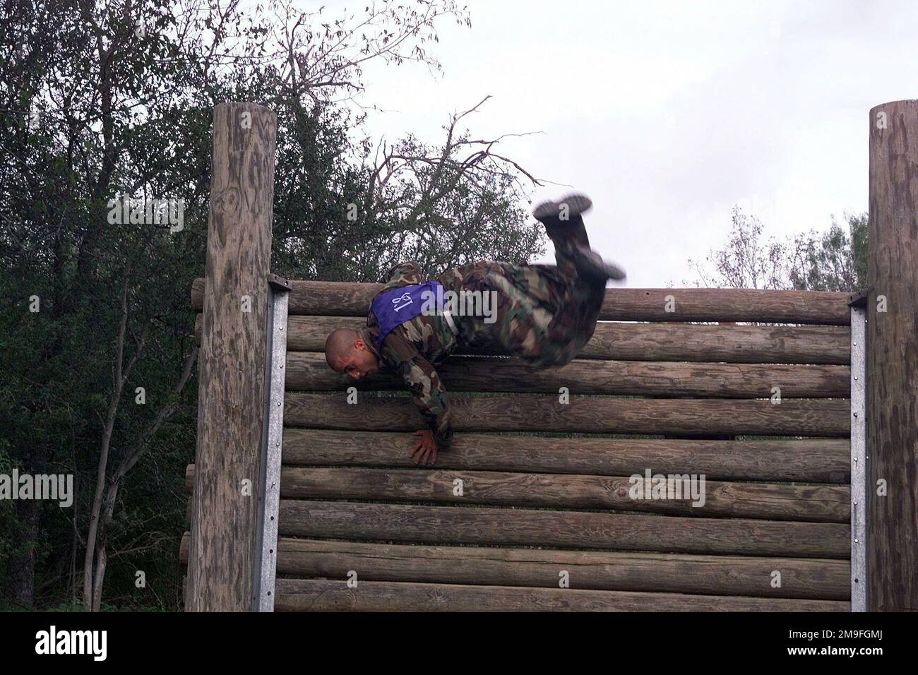 Making it looking effortless to scale the log wall, US Air Force SENIOR ...