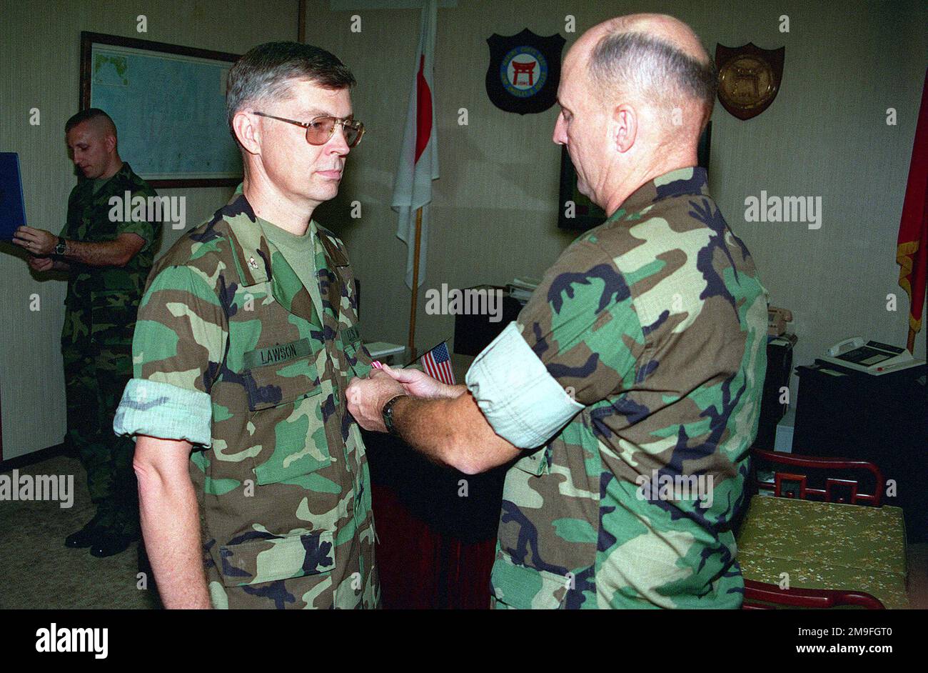 US Marine Corps Brigadier General (BGEN), Hayes, presents the Marine ...