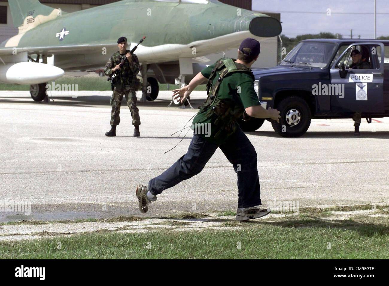 Simulated perpetrator, US Air Force SENIOR AIRMAN Deryck Schnee, is ...